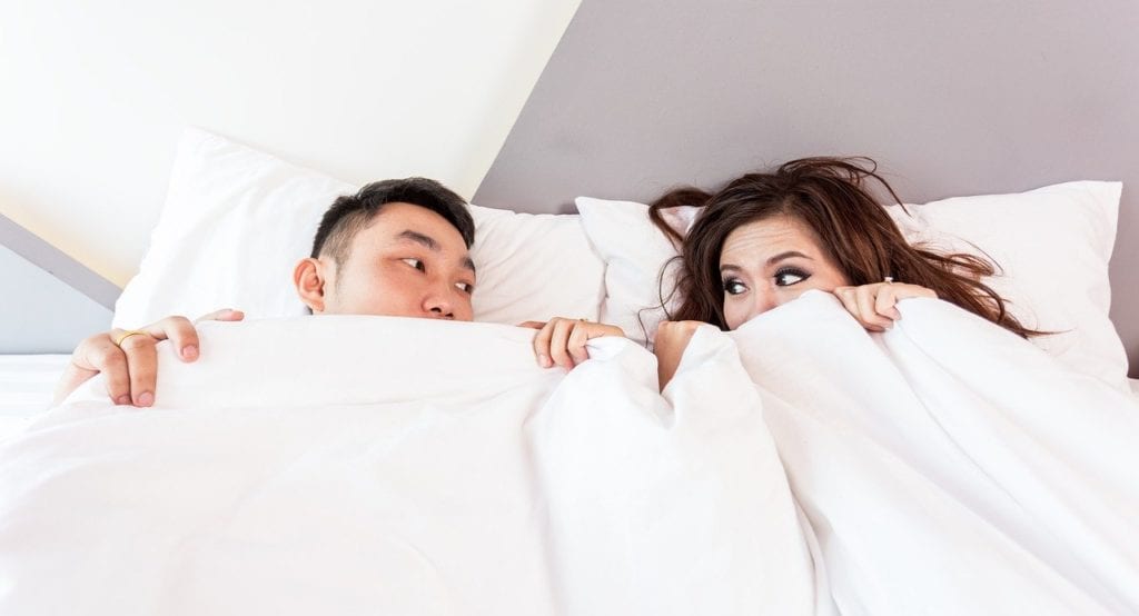 19 common sleep positions couples find themselves in & what they mean